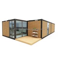 China Steel Frame Galvanized Steel Bending 180g 20ft 40ft Prefab Home with Modern Container Design and Wave Sandwich Panel Walls for sale