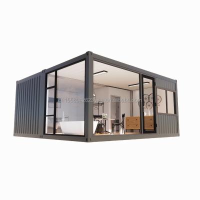 China Affordable 20ft or 40ft Portable Light Steel Flat Roof Container Prefab Studio Home House with Customized Color for sale