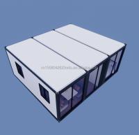 China Container Houses Affordable Steel Structure Prefab Homes with 50/75/100mm Wave Sandwich Panel Walls for sale