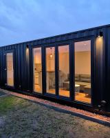 China Customizable 2/3 Bedrooms Luxury Portable Garden House with Toilet and Wall 50/75/100mm Wave Sandwich Panel for sale