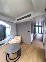 China Customized Color Soundproof Space Capsule Prefab Tiny House with Wall 50/75/100mm Wave Sandwich Panel for sale