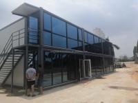 China Affordable 20ft Knock Down Sandwich Panel Portable Prefab Hotel Container Modular House with Aluminum Alloy Windows for sale