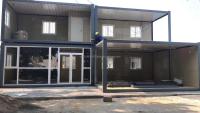 China Affordable 20ft Knock Down Sandwich Panel Portable Prefab Hotel Container Modular House with Aluminum Alloy Windows for sale