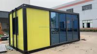 China Customized Color 20ft Prefabricated Flat Package Bulk Container Frame House for Migrant Workers on Construction Site for sale