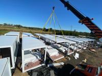 China Modern Wooden Appearance Flat Packaging Mobile House Steel Frame Galvanized Steel Bending 180g for 10ft 20ft Container for sale