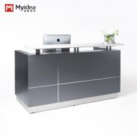 China Modern Minimalist Wood Reception Desk with Dark Front Panels and Marble Top - 3 Year Warranty, ISO9001 Certified for sale