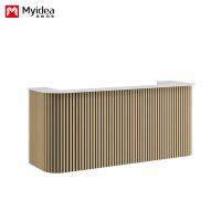 China Custom Wooden Grating Front Desk Office Reception Desk White Mountain Pattern Rock Board Modern Simple 120cm for sale