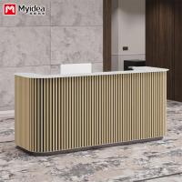 China Custom Wooden Grating Front Desk Office Reception Desk White Mountain Pattern Rock Board Modern Simple 120cm for sale