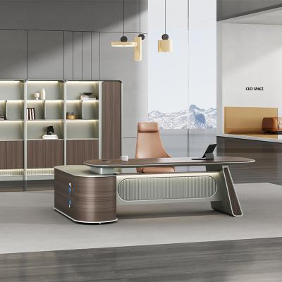 China Intelligent PVC Coated Curved Manager Desk with Voice Controlled Ambient Light 450lb Capacity for sale