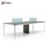 China Commercial-Grade Face-to-Face Workstation with Steel Frame, Integrated Cable Channels, and Desk Divider – Perfect for Corporate Team Spaces. for sale