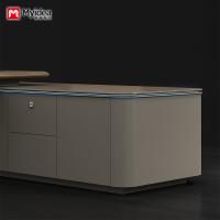 China Premium Managerial Desk with Built-In Power Outlets, Storage Return Cabinet, and Sturdy Steel Legs for sale