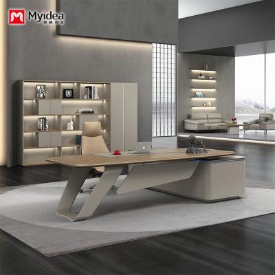 China Premium Managerial Desk with Built-In Power Outlets, Storage Return Cabinet, and Sturdy Steel Legs for sale