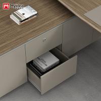 China Premium Managerial Desk with Built-In Power Outlets, Storage Return Cabinet, and Sturdy Steel Legs for sale