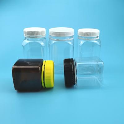 China Empty 200ml 320ml 400ml Plastic Honey Jar Square With Tamper Evident Lid for sale