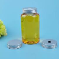 China 650ml Empty Milk Tea Plastic Beverage Bottle With Aluminum Screw Lid for sale