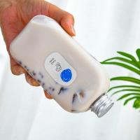 China Transparent PET 400ml 15cm Disposable Juice Bottles for sale