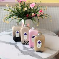 China Cold Beverage 24mm 400ml Plastic Juice Bottles With Caps for sale