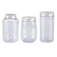China Round Cylinder Empty 650ml 54MM Plastic Beverage Jar for sale