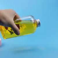 China Food Grade Transparent Disposable 500ml Plastic Juice Bottles With Screw Cap for sale