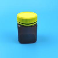 China Amber Bottle Square Child Proof 400ml Plastic Candy Jars for sale