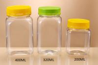 China BPA Free 320ml Plastic Food Jars Airless Square Honey Bottle With Lid for sale