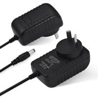 China Surge Protected 12v 2a Led Power Supply With Interchangeable Us/Eu/Uk/Au/Cn Plug for sale