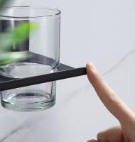 China Multifunctional Wall Mounted Toothbrush Holder Matte Black Color ODM for sale