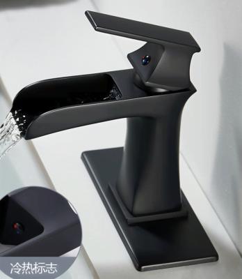 China Black Brass Cold And Hot Waterfall Basin Tap Faucet Single Hole for sale