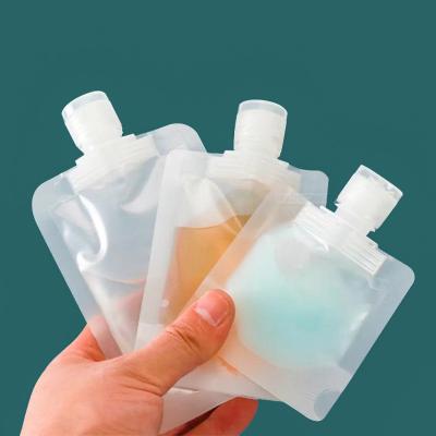China Flap Spout Bag 30ml 50ml 100ml Capacity Food-Grade Packaging with Self-Adhesive Seal for sale