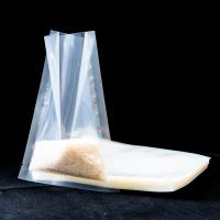 China Transparent Nylon Laminate Vacuum Bags 80-150 Microns with Three-Side Seal for Food Packaging 15-40cm Width for sale