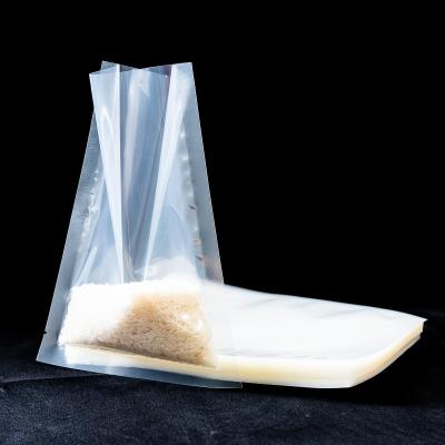 China Transparent Nylon Laminate Vacuum Bags 80-150 Microns with Three-Side Seal for Food Packaging 15-40cm Width for sale