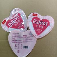 China Custom Logo Heart Shape Stand Up Zipper Pouches 4oz Food Safe Resealable Packaging Bags for sale