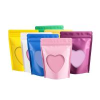 China Custom Logo Heart Shape Stand Up Zipper Pouches 4oz 100 Micron Food Safe Resealable Bags for sale