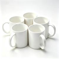 China Blank Ceramic Mug High-grade Food-safe White Porcelain with Smooth Even Glaze and Ergonomic Curved Handle for sale