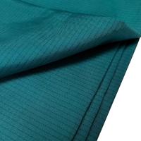 China 166*89 Anti Static Polyester Fabric 5mm Grid For Disposable Protective Gown for sale