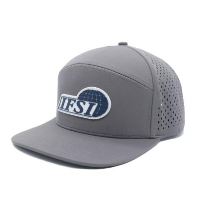 China 7-Panel Flat Bill Laser Cut Performance Snapback Hat For Unisex Waterproof for sale