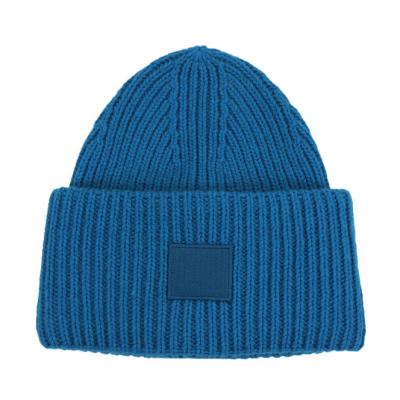 China Thick Knitted Cuffed Skull Cap Winter Hat 100% Acrylic Beanie for sale