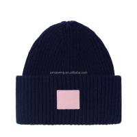 China Thick Knitted Cuffed Skull Cap Winter Hat 100% Acrylic Beanie for sale