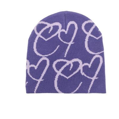 China Custom Reversible Jacquard Cuffless Slouchy Beanie Hat 100% Acrylic Winter Knit for sale