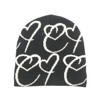 China Custom Reversible Jacquard Cuffless Slouchy Beanie Hat 100% Acrylic Winter Knit for sale
