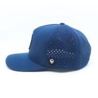 China Unisex Custom Navy Blue Baseball Cap With PVC Rubber Patch Logo And Waterproof Design for sale