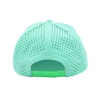 China Blue Curved Brim Hat With Custom Rubber Patch Logo And Waterproof Laser Cut Design for sale