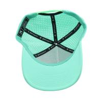 China Blue Curved Brim Hat With Custom Rubber Patch Logo And Waterproof Laser Cut Design for sale