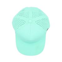 China Blue Curved Brim Hat With Custom Rubber Patch Logo And Waterproof Laser Cut Design for sale