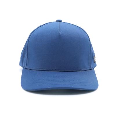 China Custom Navy Blue Baseball Golf Hat With PVC Rubber Patch Logo And Drilled Hole Design for sale