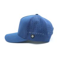 China Custom Navy Blue Baseball Golf Hat With PVC Rubber Patch Logo And Drilled Hole Design for sale