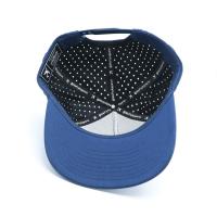 China Custom Navy Blue Baseball Golf Hat With PVC Rubber Patch Logo And Drilled Hole Design for sale