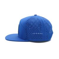 China Flat Brim Baseball Hat With 7-Panel Embossed Rubber PVC Logo Waterproof Laser Cut Hole for sale