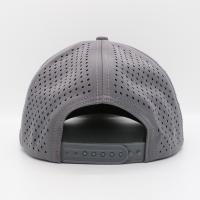 China Custom 5 Panel Waterproof Baseball Cap with Rubber PVC Logo Laser Cut Holes 56-60cm Adult Size for sale