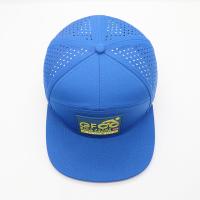 China Custom Waterproof 7 Panel Laser Cut Hole Snapback Cap Hat with Rubber Patch 56-60cm Adult Size for sale